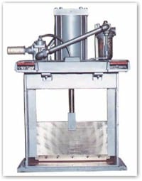 Rubber Cutter: Pneumatic Guillotine Style Bulk Rubber Cutter